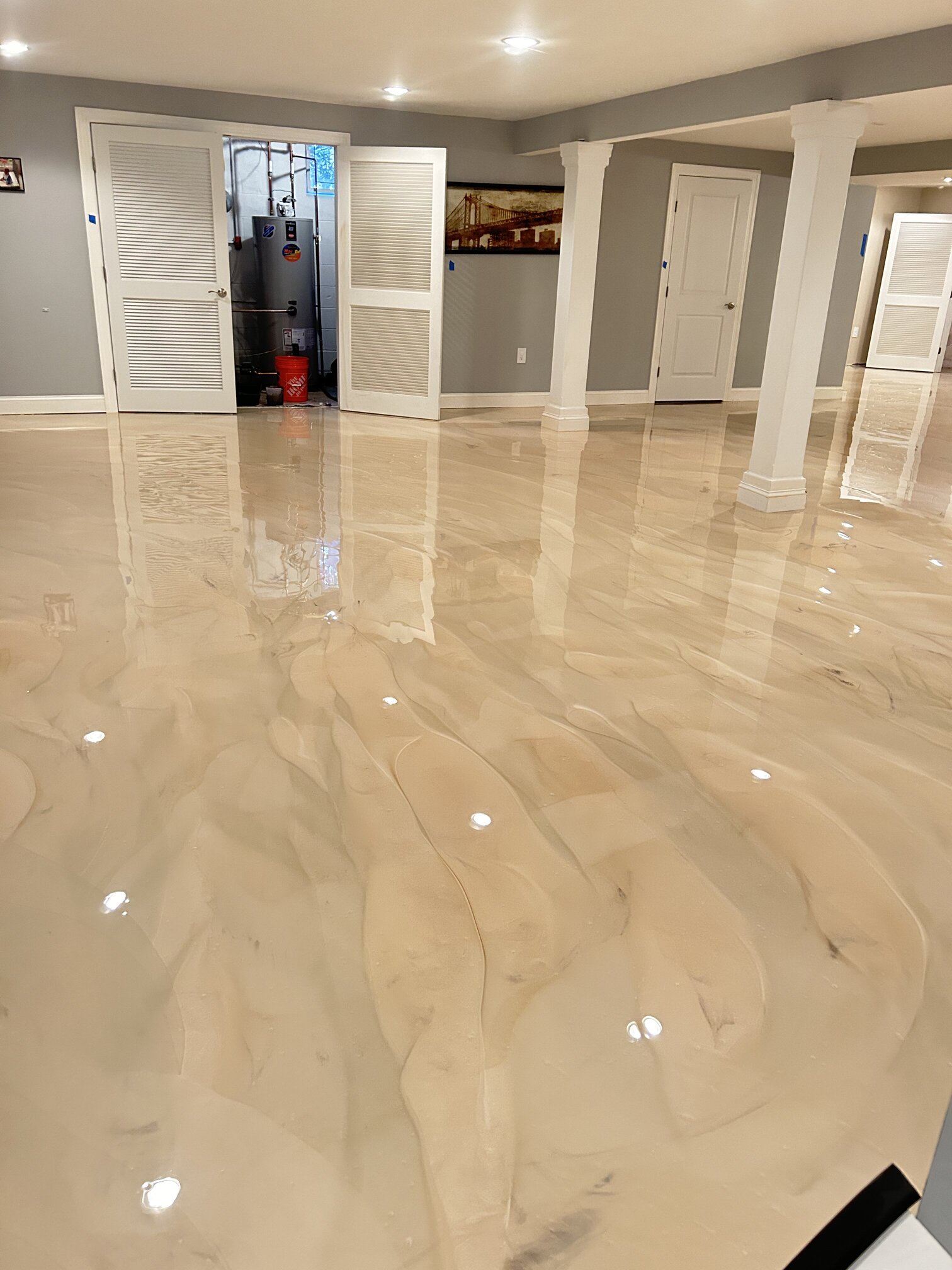 Project Basement with Metallic Epoxy Flooring